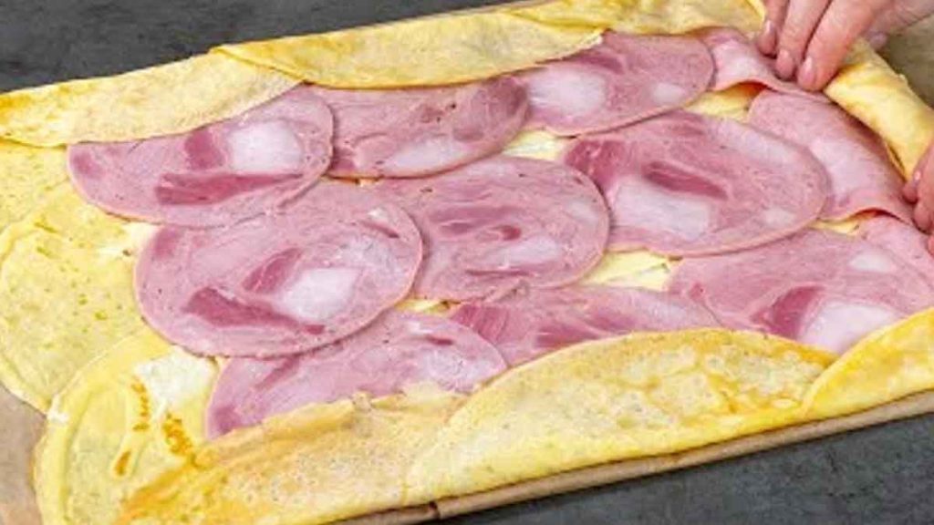 Rouleau de crêpes farci au four: savoureux et simple